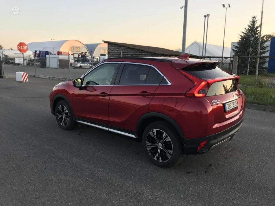 Red Mitsubishi Eclipse Cross 2019 in Marijampole, with an engine capacity of 1.50 L and mileage of 126 thousand km for 13500 €, photo 9 on AUTOMOTO.COM.LV