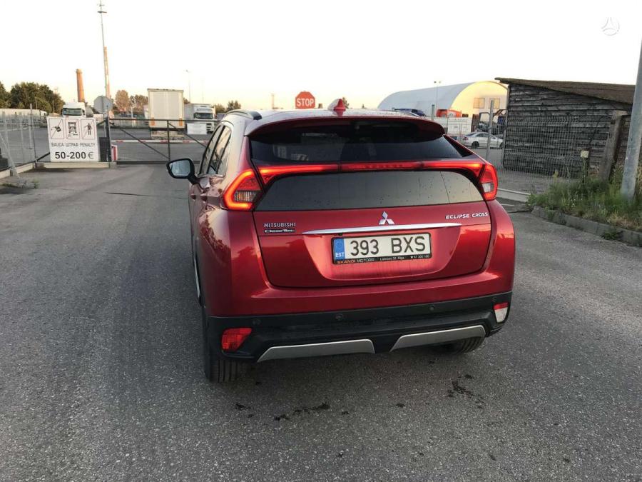 Red Mitsubishi Eclipse Cross 2019 in Marijampole, with an engine capacity of 1.50 L and mileage of 126 thousand km for 13500 €, photo 10 on AUTOMOTO.COM.LV