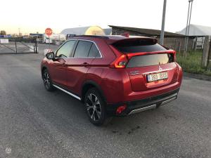 Red Mitsubishi Eclipse Cross 2019 in Marijampole, with an engine capacity of 1.50 L and mileage of 126 thousand km for 13500 €, photo 12 on AUTOMOTO.COM.LV