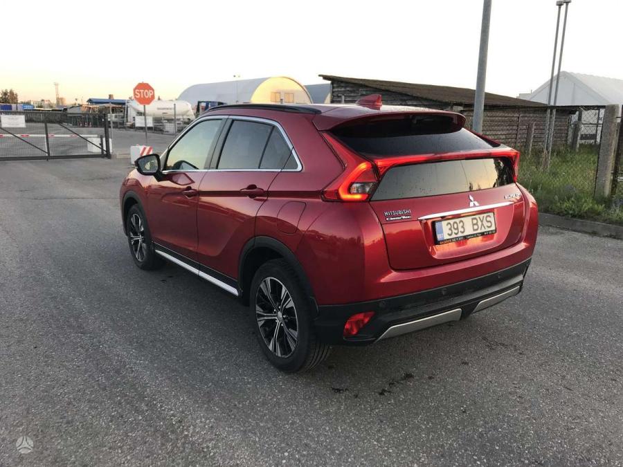 Red Mitsubishi Eclipse Cross 2019 in Marijampole, with an engine capacity of 1.50 L and mileage of 126 thousand km for 13500 €, photo 12 on AUTOMOTO.COM.LV