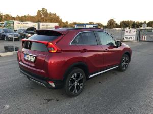 Red Mitsubishi Eclipse Cross 2019 in Marijampole, with an engine capacity of 1.50 L and mileage of 126 thousand km for 13500 €, photo 14 on AUTOMOTO.COM.LV