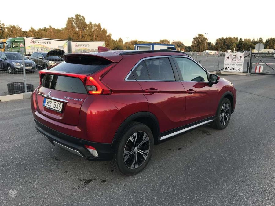 Red Mitsubishi Eclipse Cross 2019 in Marijampole, with an engine capacity of 1.50 L and mileage of 126 thousand km for 13500 €, photo 14 on AUTOMOTO.COM.LV