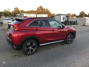 Red Mitsubishi Eclipse Cross 2019 in Marijampole, with an engine capacity of 1.50 L and mileage of 126 thousand km for 13500 €, photo 15 on AUTOMOTO.COM.LV