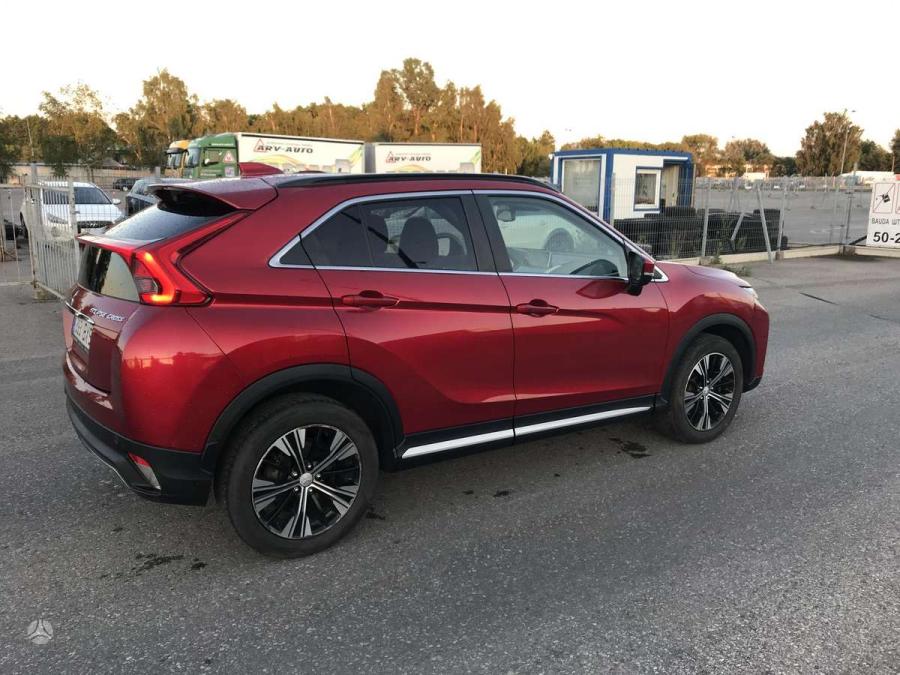 Red Mitsubishi Eclipse Cross 2019 in Marijampole, with an engine capacity of 1.50 L and mileage of 126 thousand km for 13500 €, photo 15 on AUTOMOTO.COM.LV