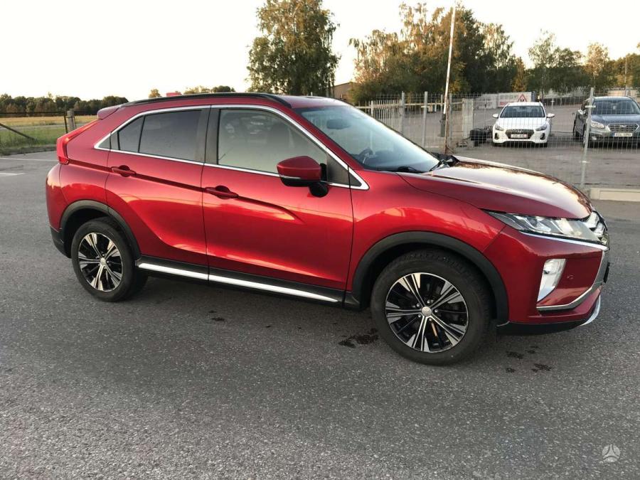 Red Mitsubishi Eclipse Cross 2019 in Marijampole, with an engine capacity of 1.50 L and mileage of 126 thousand km for 13500 €, photo 17 on AUTOMOTO.COM.LV