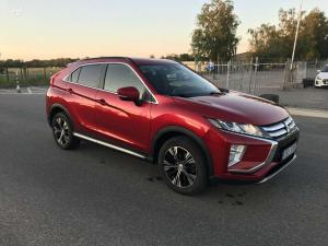 Red Mitsubishi Eclipse Cross 2019 in Marijampole, with an engine capacity of 1.50 L and mileage of 126 thousand km for 13500 €, photo 19 on AUTOMOTO.COM.LV