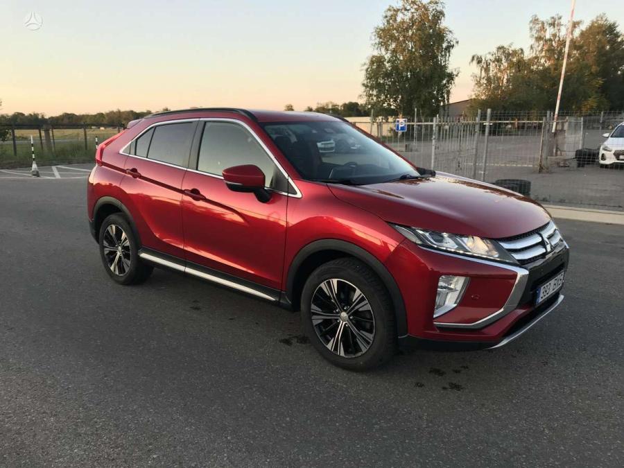 Red Mitsubishi Eclipse Cross 2019 in Marijampole, with an engine capacity of 1.50 L and mileage of 126 thousand km for 13500 €, photo 19 on AUTOMOTO.COM.LV