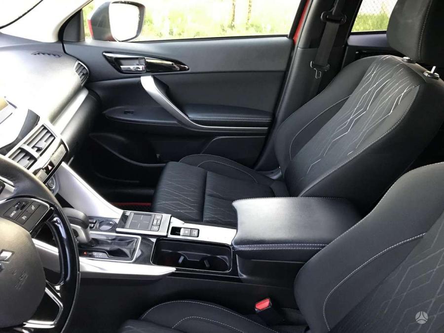 Red Mitsubishi Eclipse Cross 2019 in Marijampole, with an engine capacity of 1.50 L and mileage of 126 thousand km for 13500 €, photo 24 on AUTOMOTO.COM.LV