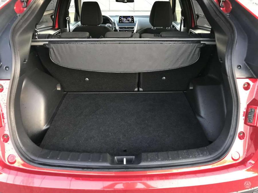 Red Mitsubishi Eclipse Cross 2019 in Marijampole, with an engine capacity of 1.50 L and mileage of 126 thousand km for 13500 €, photo 27 on AUTOMOTO.COM.LV