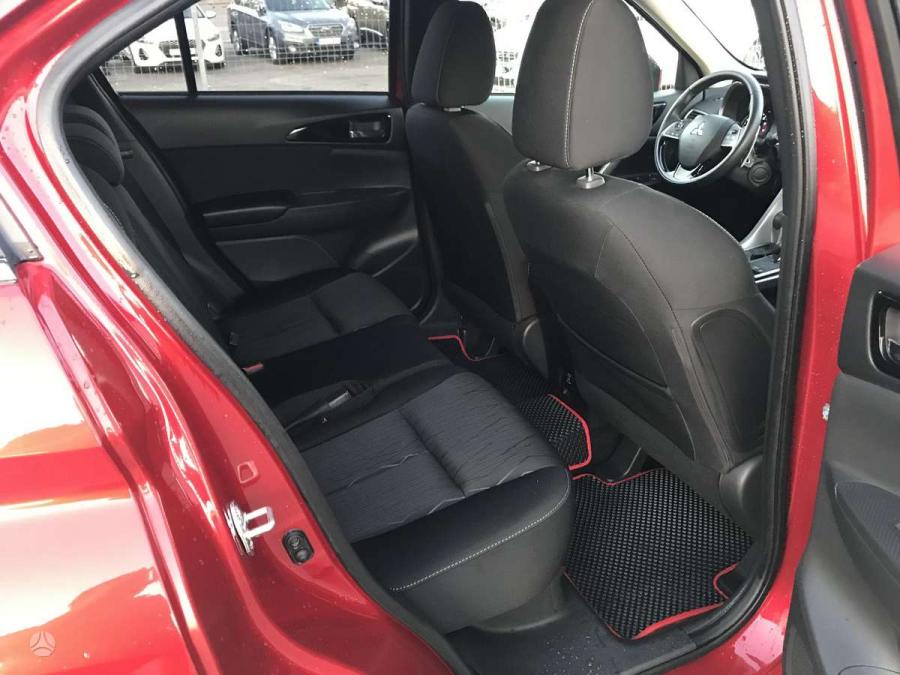 Red Mitsubishi Eclipse Cross 2019 in Marijampole, with an engine capacity of 1.50 L and mileage of 126 thousand km for 13500 €, photo 29 on AUTOMOTO.COM.LV