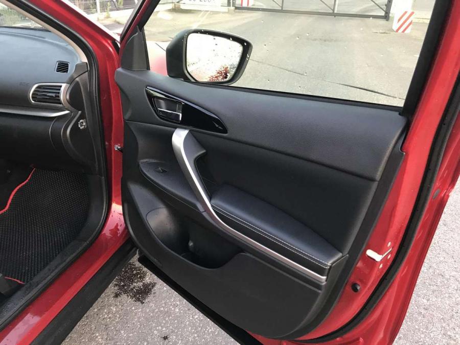 Red Mitsubishi Eclipse Cross 2019 in Marijampole, with an engine capacity of 1.50 L and mileage of 126 thousand km for 13500 €, photo 30 on AUTOMOTO.COM.LV