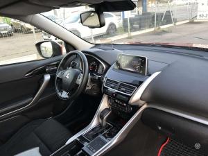 Red Mitsubishi Eclipse Cross 2019 in Marijampole, with an engine capacity of 1.50 L and mileage of 126 thousand km for 13500 €, photo 32 on AUTOMOTO.COM.LV
