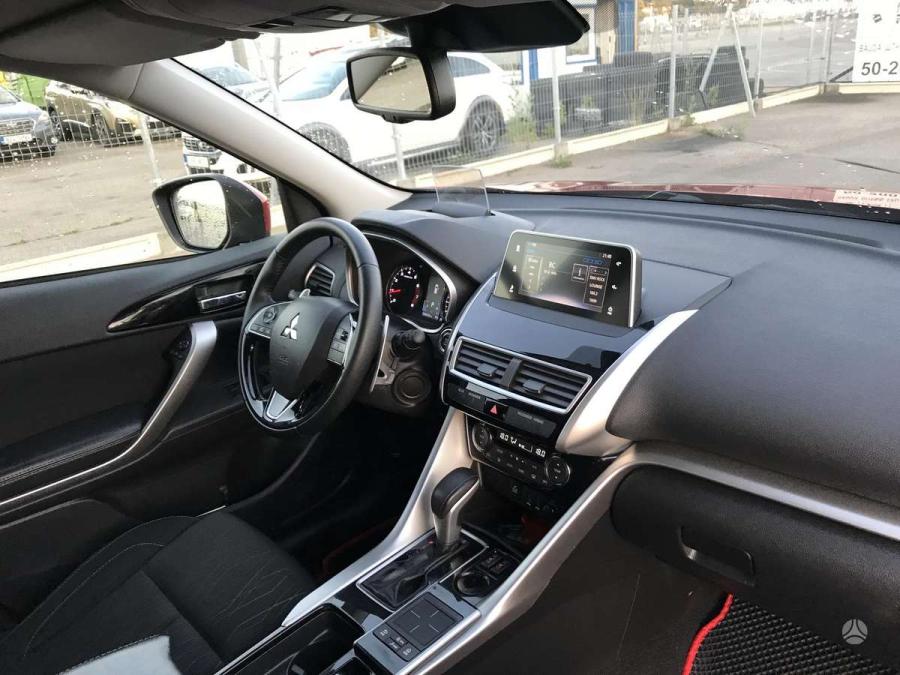 Red Mitsubishi Eclipse Cross 2019 in Marijampole, with an engine capacity of 1.50 L and mileage of 126 thousand km for 13500 €, photo 32 on AUTOMOTO.COM.LV