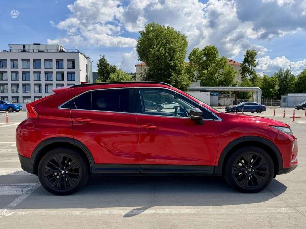 Red Mitsubishi Eclipse Cross 2020 in Vilnius, with an engine capacity of 2.27 L and mileage of 124 thousand km for 19999 €, photo 7 on AUTOMOTO.COM.LV