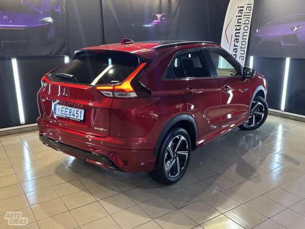 Red Mitsubishi Eclipse Cross 2022 in Avizieniai, with an engine capacity of 2.40 L and mileage of 128 thousand km for 20750 €, photo 2 on AUTOMOTO.COM.LV