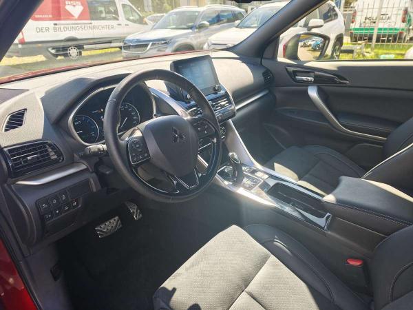 Red Mitsubishi Eclipse Cross 2024 in Siauliai, with an engine capacity of 2.36 L and mileage of 36 thousand km for 18900 €, photo 10 on AUTOMOTO.COM.LV