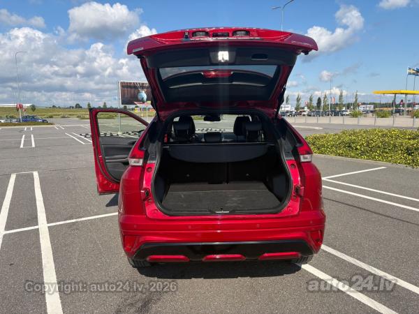 Red Mitsubishi Eclipse Cross 2021 in Tallinn, with an engine capacity of 2.40 L and mileage of 31 thousand km for 22000 €, photo 6 on AUTOMOTO.COM.LV