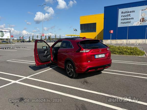 Red Mitsubishi Eclipse Cross 2021 in Tallinn, with an engine capacity of 2.40 L and mileage of 31 thousand km for 22000 €, photo 7 on AUTOMOTO.COM.LV