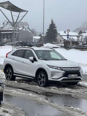 White Mitsubishi Eclipse Cross 2018 in Vilnius, with an engine capacity of 1.50 L and mileage of 135 thousand km for 15200 €, photo  on AUTOMOTO.COM.LV