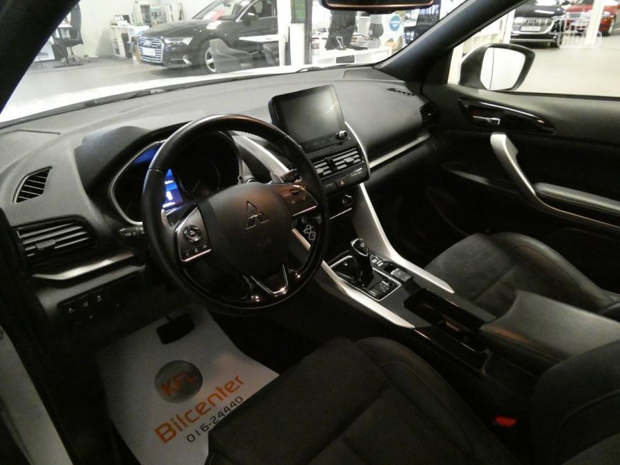 White Mitsubishi Eclipse Cross 2021 in Kaunas, with an engine capacity of 0.00 L and mileage of 93 thousand km for 24231 €, photo 13 on AUTOMOTO.COM.LV