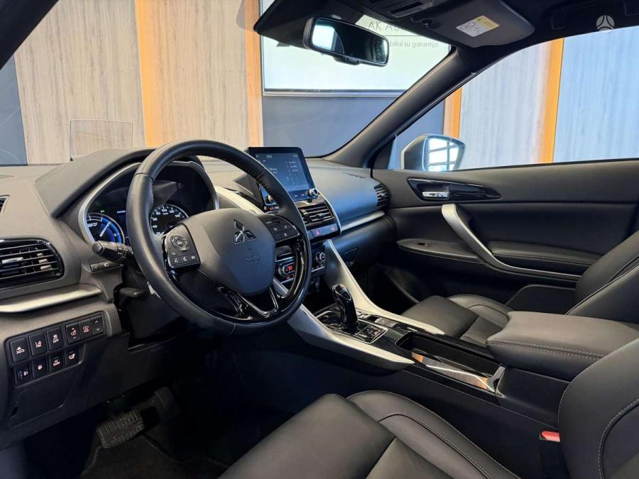 White Mitsubishi Eclipse Cross 2021 in Kaunas, with an engine capacity of 2.36 L and mileage of 68 thousand km for 21990 €, photo 12 on AUTOMOTO.COM.LV