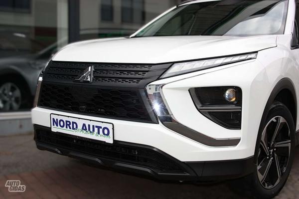 White Mitsubishi Eclipse Cross 2022 in Kaunas, with an engine capacity of 2.40 L and mileage of 57 thousand km for 22369 €, photo 4 on AUTOMOTO.COM.LV