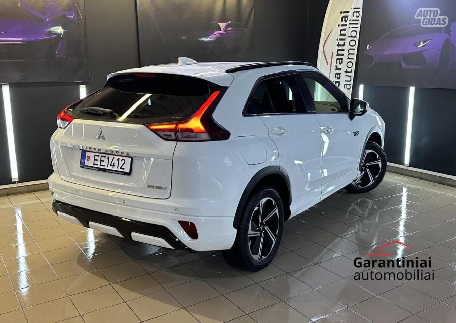 Balts Mitsubishi Eclipse Cross 2023 Avižieniai, ar dzinēja tilpumu 2.40 L un nobraukumu 92 tūkst. km par 22550 €, foto 2 vietnē AUTOMOTO.COM.LV