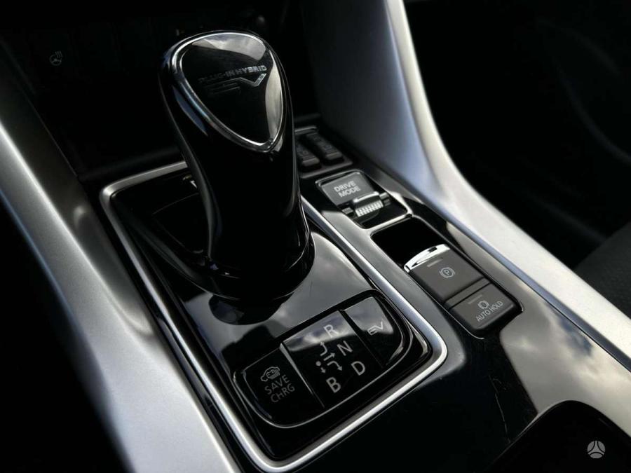 White Mitsubishi Eclipse Cross 2023 in Vilnius, with an engine capacity of 2.40 L and mileage of 118 thousand km for 21550 €, photo 22 on AUTOMOTO.COM.LV