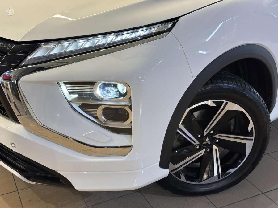 White Mitsubishi Eclipse Cross 2023 in Vilnius, with an engine capacity of 2.40 L and mileage of 118 thousand km for 21550 €, photo 33 on AUTOMOTO.COM.LV