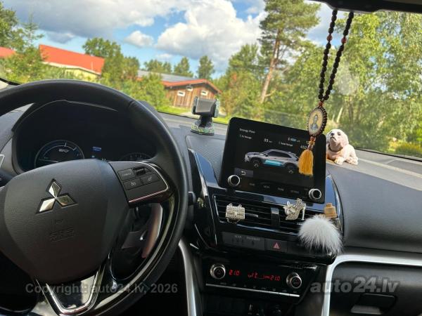 White Mitsubishi Eclipse Cross 2022 in Tallinn, with an engine capacity of 2.40 L and mileage of 45 thousand km for 18500 €, photo 10 on AUTOMOTO.COM.LV