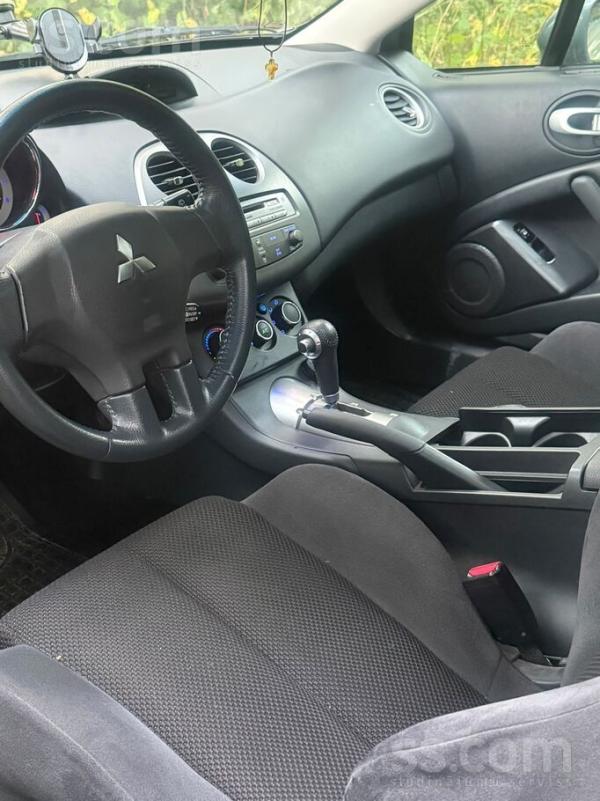 Grey Mitsubishi Eclipse 2006 in Ogre, with an engine capacity of 2.40 L and mileage of 91 thousand km for 2800 €, photo 9 on AUTOMOTO.COM.LV
