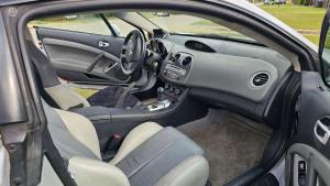 Pelēks Mitsubishi Eclipse 2006 Viļņa, ar dzinēja tilpumu 2.38 L un nobraukumu 166 tūkst. km par 3000 €, foto 13 vietnē AUTOMOTO.COM.LV