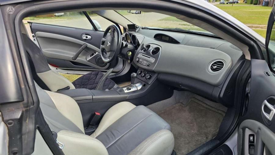 Pelēks Mitsubishi Eclipse 2006 Viļņa, ar dzinēja tilpumu 2.38 L un nobraukumu 166 tūkst. km par 3000 €, foto 13 vietnē AUTOMOTO.COM.LV