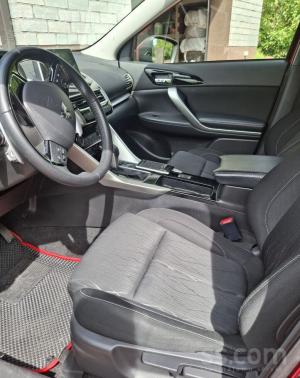 Red Mitsubishi Eclipse 2019 in Riga, with an engine capacity of 1.50 L and mileage of 127 thousand km for 11300 €, photo 7 on AUTOMOTO.COM.LV
