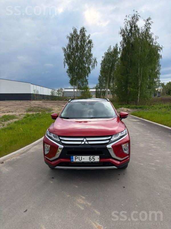 Red Mitsubishi Eclipse 2018 in Dobele, with an engine capacity of 1.50 L and mileage of 125 thousand km for 12900 €, photo 3 on AUTOMOTO.COM.LV