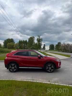 Red Mitsubishi Eclipse 2018 in Dobele, with an engine capacity of 1.50 L and mileage of 125 thousand km for 12900 €, photo 5 on AUTOMOTO.COM.LV