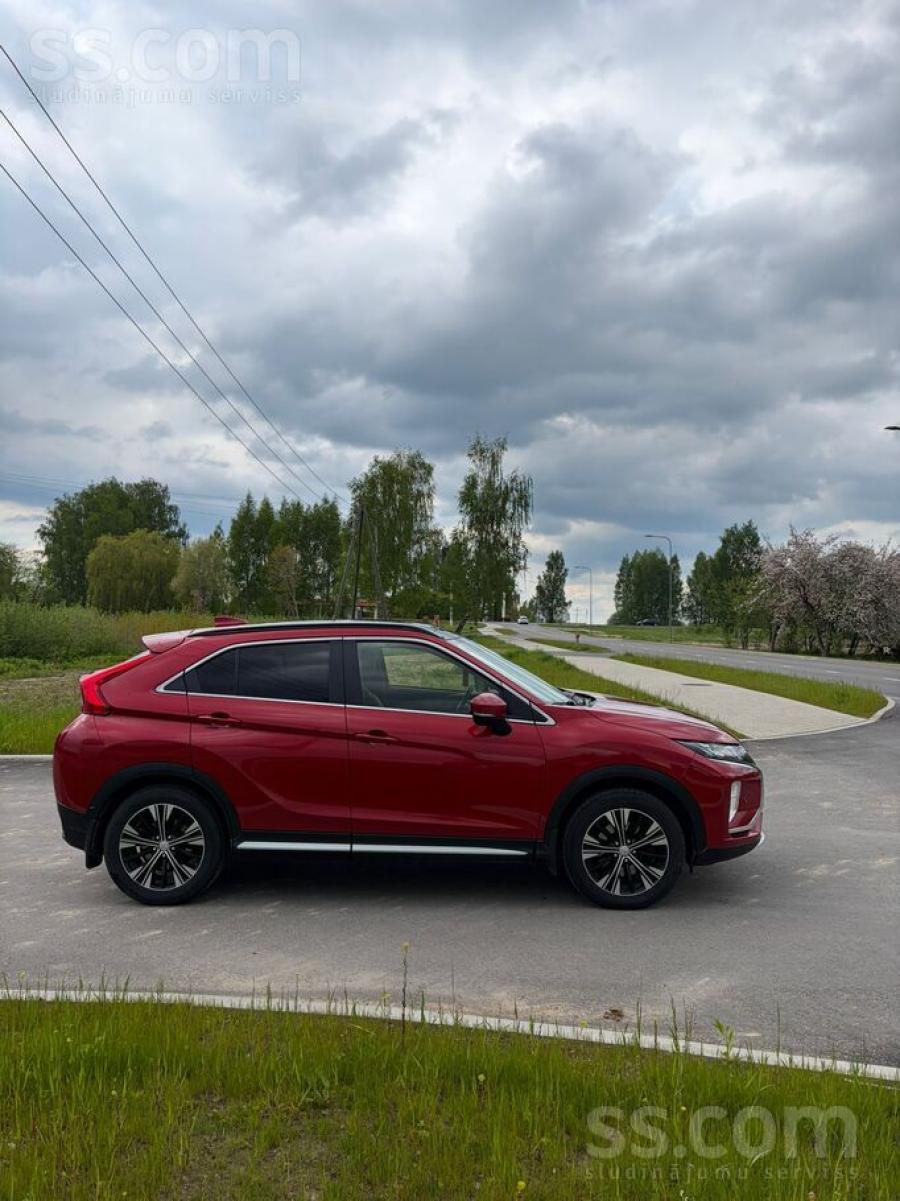 Red Mitsubishi Eclipse 2018 in Dobele, with an engine capacity of 1.50 L and mileage of 125 thousand km for 12900 €, photo 5 on AUTOMOTO.COM.LV