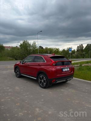 Red Mitsubishi Eclipse 2018 in Dobele, with an engine capacity of 1.50 L and mileage of 125 thousand km for 12900 €, photo 6 on AUTOMOTO.COM.LV