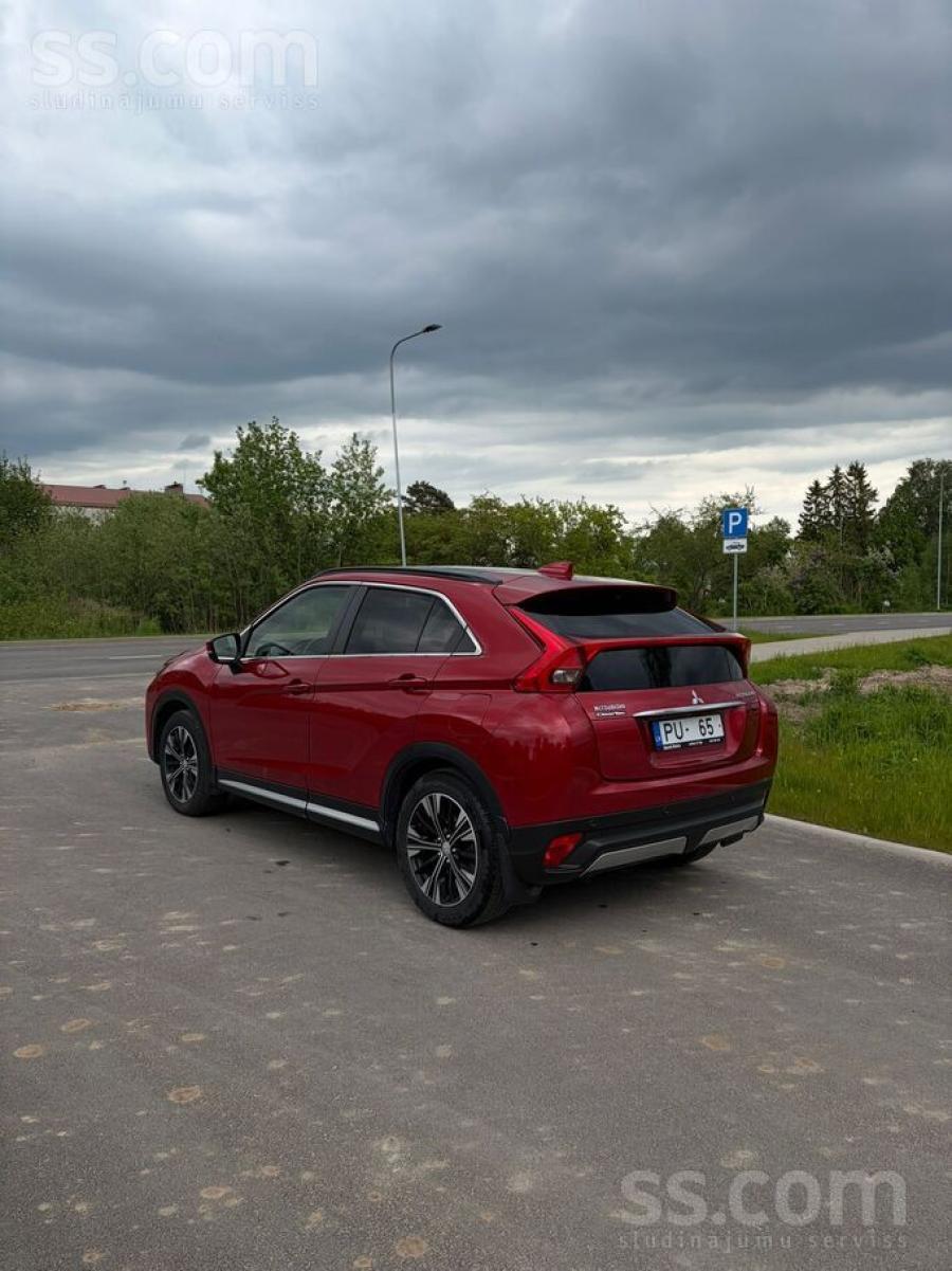 Red Mitsubishi Eclipse 2018 in Dobele, with an engine capacity of 1.50 L and mileage of 125 thousand km for 12900 €, photo 6 on AUTOMOTO.COM.LV