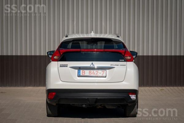 White Mitsubishi Eclipse 2019 in Talsi, with an engine capacity of 2.30 L and mileage of 183 thousand km for 13950 €, photo 5 on AUTOMOTO.COM.LV