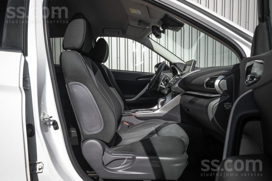 White Mitsubishi Eclipse 2019 in Talsi, with an engine capacity of 2.30 L and mileage of 183 thousand km for 13950 €, photo 13 on AUTOMOTO.COM.LV