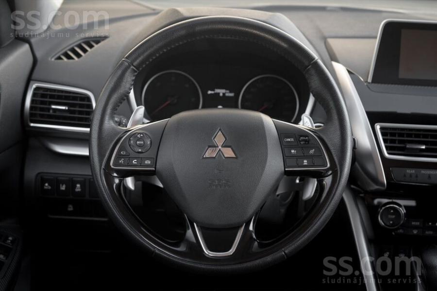 White Mitsubishi Eclipse 2019 in Talsi, with an engine capacity of 2.30 L and mileage of 183 thousand km for 13950 €, photo 19 on AUTOMOTO.COM.LV