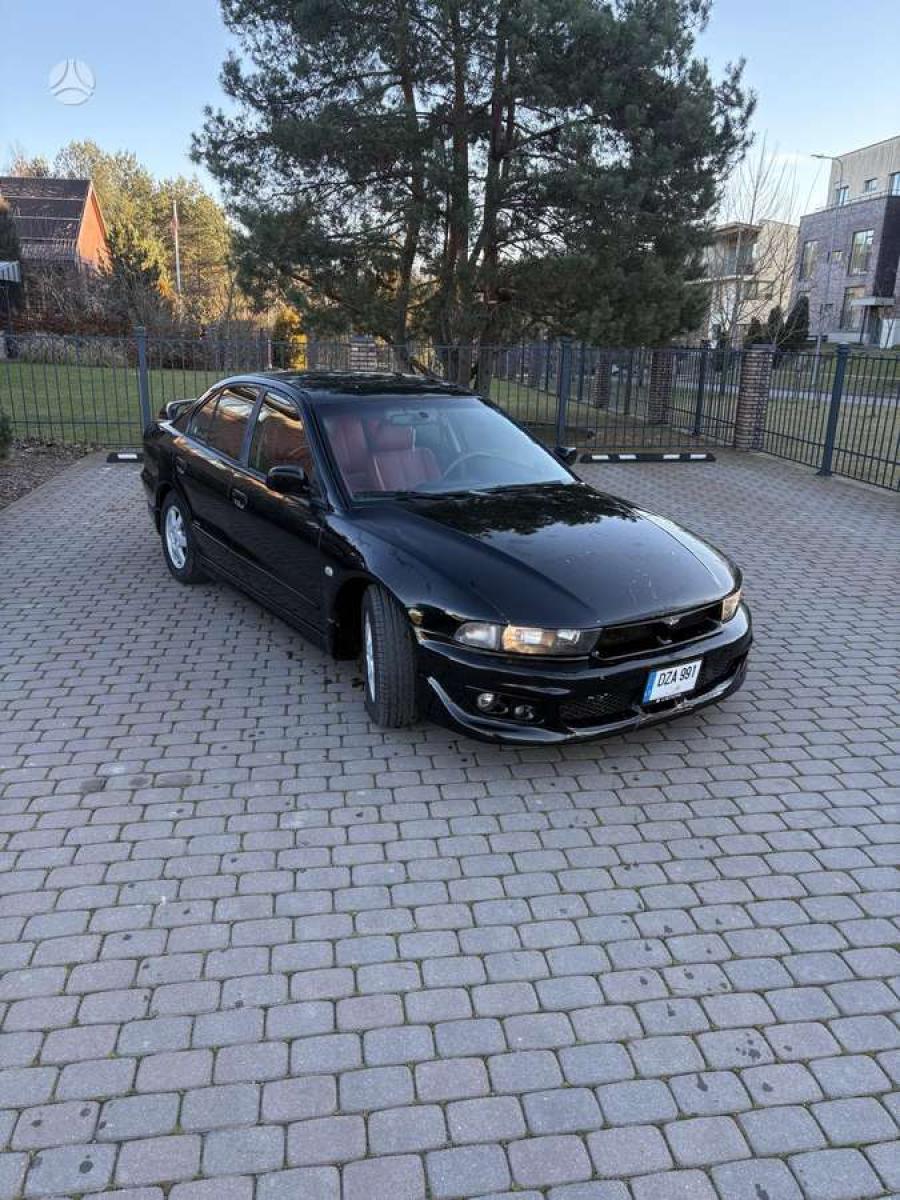 Black Mitsubishi Galant 2001 in Vilnius, with an engine capacity of 2.50 L and mileage of 22 thousand km for 2222 €, photo 2 on AUTOMOTO.COM.LV