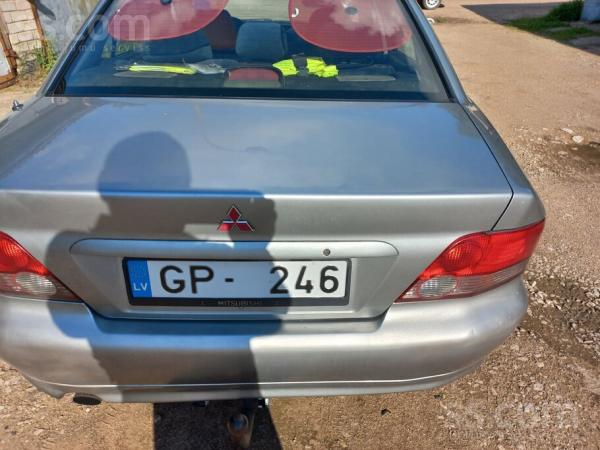 Grey Mitsubishi Galant 1999 in Jekabpils, with an engine capacity of 2.30 L and mileage of 270 thousand km for 1200 €, photo 3 on AUTOMOTO.COM.LV