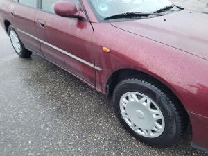 Sarkans Mitsubishi Galant 1993 Marijampole, ar dzinēja tilpumu 1.80 L un nobraukumu 116 tūkst. km par 1550 €, foto 2 vietnē AUTOMOTO.COM.LV