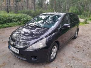 Black Mitsubishi Grandis 2007 in Riga, with an engine capacity of 2.00 L and mileage of 245 thousand km for 1200 €, photo  on AUTOMOTO.COM.LV