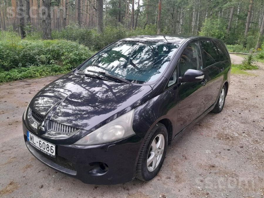 Black Mitsubishi Grandis 2007 in Riga, with an engine capacity of 2.00 L and mileage of 245 thousand km for 1200 €, photo 1 on AUTOMOTO.COM.LV
