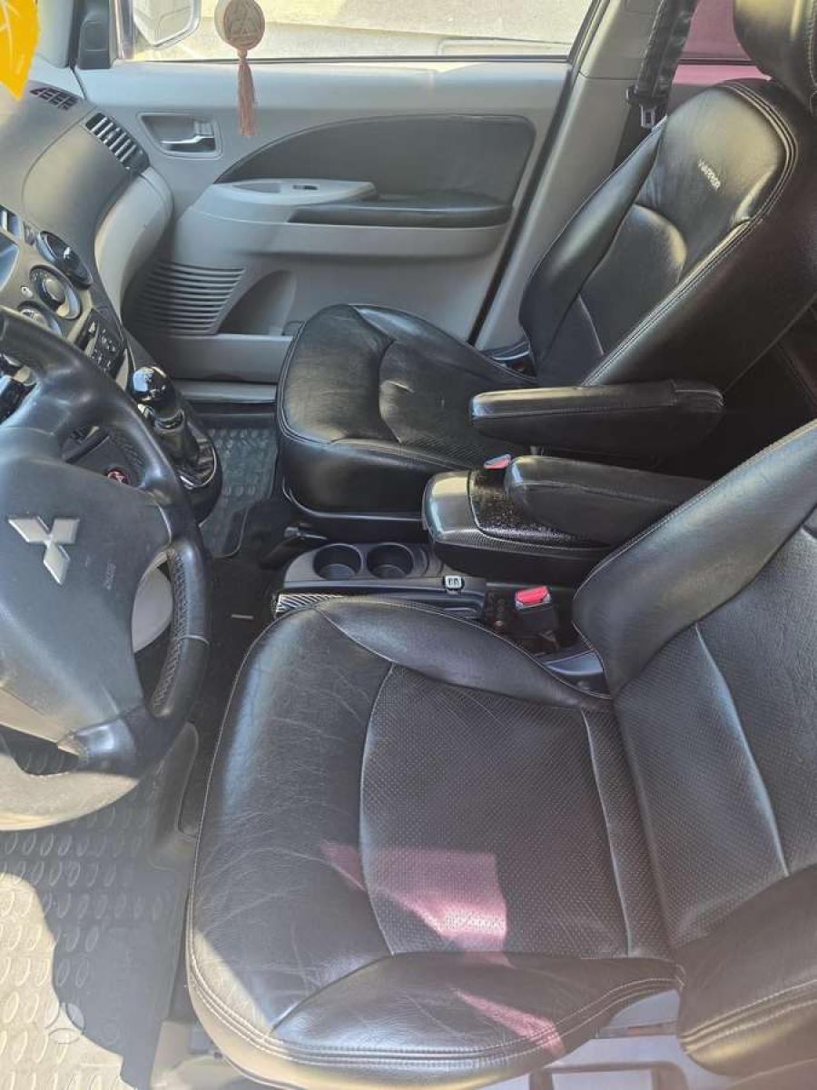 Melns Mitsubishi Grandis 2008 Kauņa, ar dzinēja tilpumu 2.38 L un nobraukumu 255 tūkst. km par 2950 €, foto 10 vietnē AUTOMOTO.COM.LV