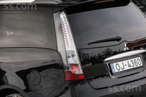 Black Mitsubishi Grandis 2011 in Jelgava, with an engine capacity of 2.40 L and mileage of 0 thousand km for 4790 €, photo 14 on AUTOMOTO.COM.LV