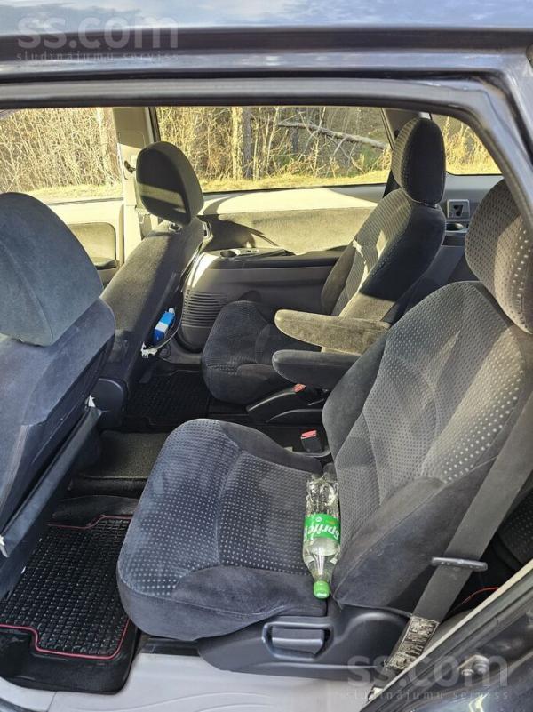 Blue Mitsubishi Grandis 2005 in Riga, with an engine capacity of 2.00 L and mileage of 312 thousand km for 1200 €, photo 5 on AUTOMOTO.COM.LV